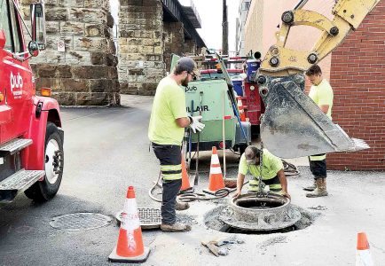 Manhole work | News, Sports, Jobs - News and Sentinel